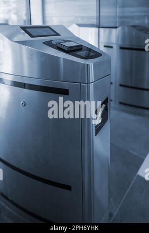 Ticket validator gates at train station Stock Photo - Alamy