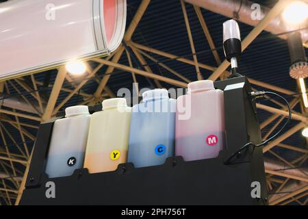 Wide-format inkjet printer. Color toners ink in the digital printer ...