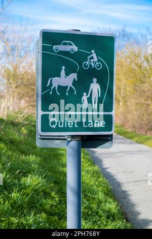 Highway Code: a road sign with the lane markings and directions at a ...