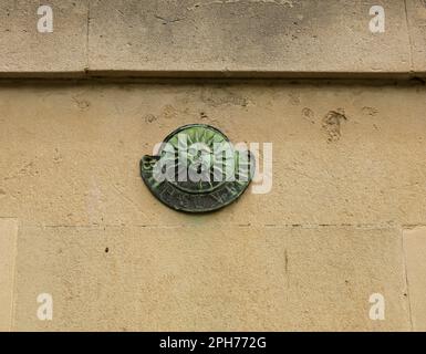 Bronze Sun Fire insurance plaque on a house in Bath. The house was ...