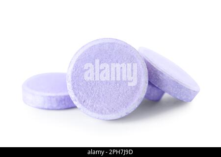 Lilac soluble tablets isolated on white background Stock Photo - Alamy