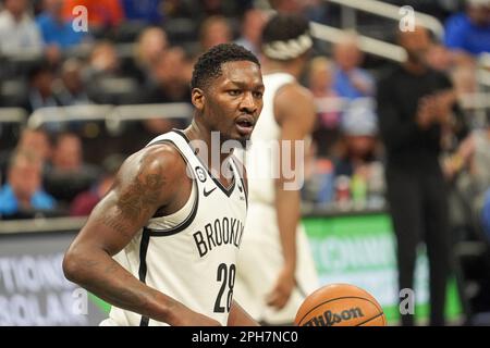 Brooklyn Nets forward Dorian Finney-Smith reacts after a play in the first half of an NBA ...