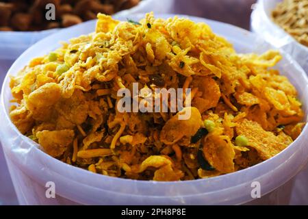 Farsan, snacks in bowls for sale in Indian Market, Traditional Indian ...