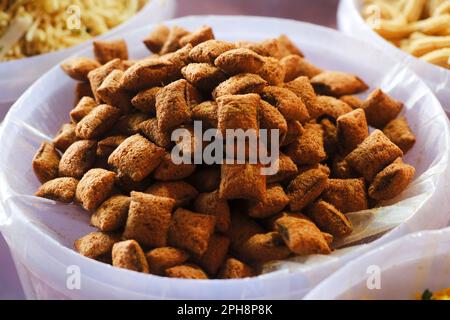 Farsan, snacks in bowls for sale in Indian Market, Traditional Indian ...