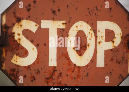 stop sign old rusty morning in the fog in the city of Dnipro drove ...