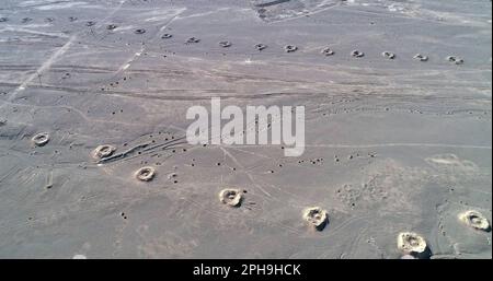 HAMI, CHINA - MARCH 26, 2023 - Aerial photo of Karez in the desert in ...