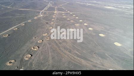 HAMI, CHINA - MARCH 26, 2023 - Aerial photo of Karez in the desert in ...