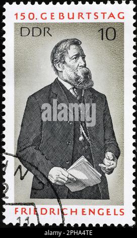 Friedrich Engels portrait on german stamp Stock Photo - Alamy