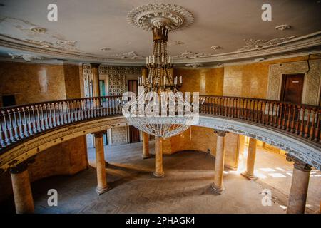 Entrance round hall with chandelier at the abandoned palace Stock Photo ...
