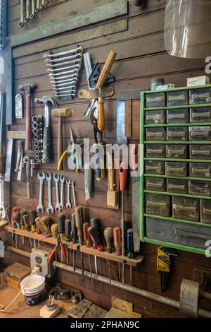 Close-up of a well-stocked workshop, tool wall, 2023, Bucks County ...