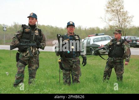 Waco Texas USA, March 1993: ATF agents guard a road leading to the ...