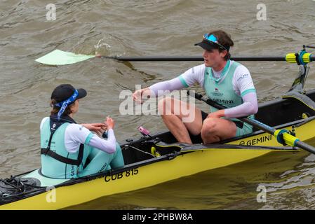 Boat Race 2023. Cambridge rowers after crossing the finish line at ...