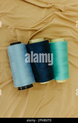 blue-green background of intertwined threads and rows. Banner. Fabric ...