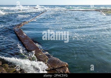 Waves at the wall of The Trinkie an outside swimming pool near Wick ...