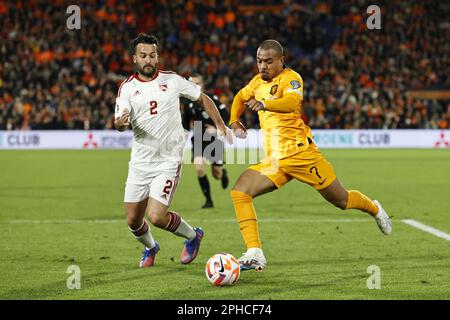 ROTTERDAM - (l-r) Ethan Jolley of Gibraltar, Donyell Malen of Holland ...