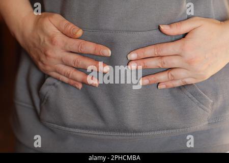 Discolouration of nails after chemotherapy. Hands of cancer patient ...