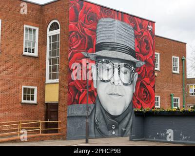 A mural of Elton John on the side of the Sir Elton John Stand outside ...