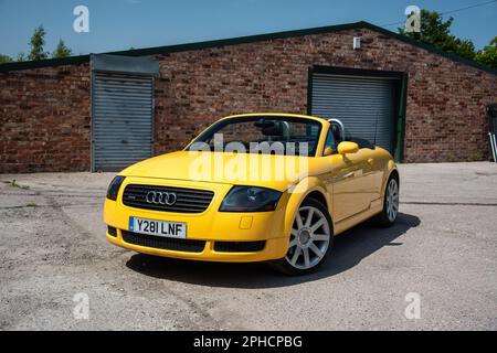 Bright yellow Audi TT convertible Stock Photo - Alamy