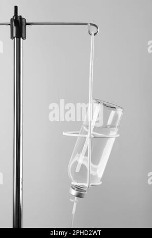 IV infusion set on light grey background Stock Photo - Alamy