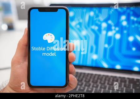 AI logo stable diffusion on the phone screen on the background of the server room. Smartphone ...