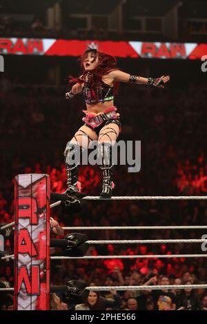 PHOENIX, ARIZONA - MARCH 27: Iyo Sky chokes Becky Lynch during WWE ...
