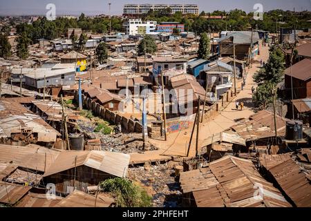 KENYA, Nairobi, Kibera slum, water hose and sewage / KENIA, Nairobi ...