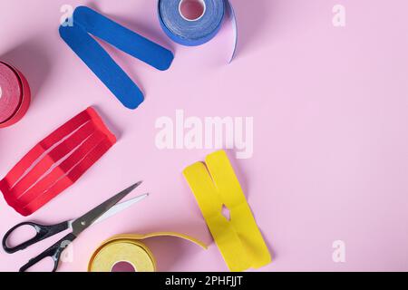 Rolls kinesiology tape in shape of an octopus and letter X for ...