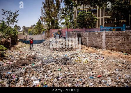 Nairobi, Kenya. 3rd Feb, 2023. A man works inside a shack of Kibera ...