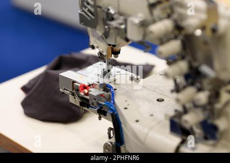 Industrial coverstitch sewing machine close up. Selective focus Stock ...