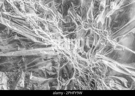 Interesting texture of white melted polyethylene on gray background ...