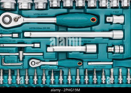 Ratchet with many attachments in plastic case. Work tools. Universal ...