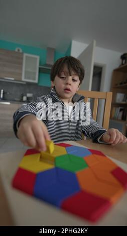 Child playing by himself at home with blocks Stock Photo - Alamy