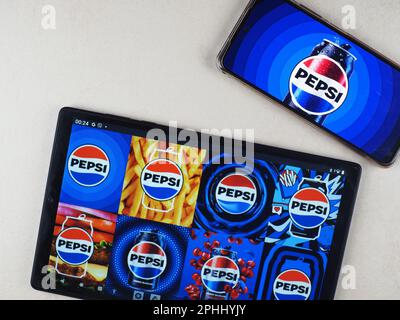 In this photo illustration, the new Pepsi logo on a smartphone and ...