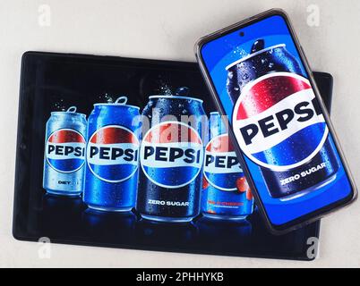 In this photo illustration, the new Pepsi logo on a smartphone and ...