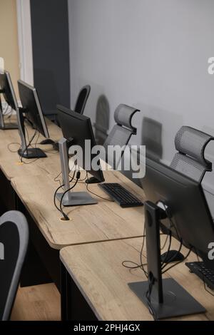 Many modern computers in open space office Stock Photo - Alamy