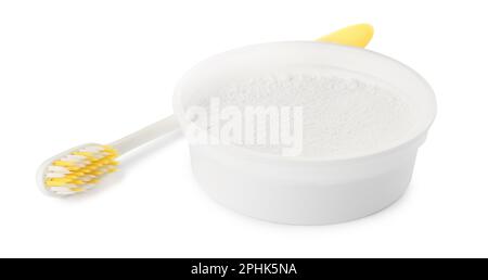 Bowl of tooth powder and brush on white background Stock Photo - Alamy