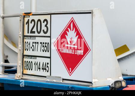 Close up of a flammable liquid sign on the back of a tanker carrying ...