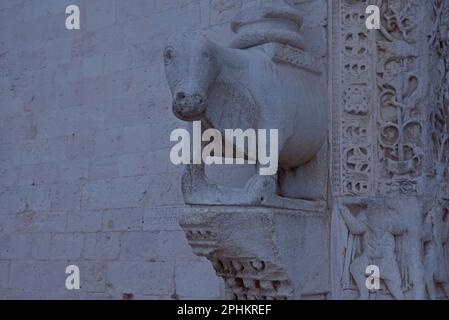 Animal figure Corbel on the archway surrounding the main entrance door ...