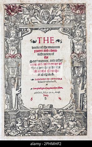 ENGLISH BOOK OF COMMON PRAYER 1549 . Archbishop Thomas Cranmer sits at ...