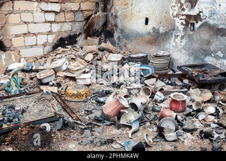 Kitchen utensils that were scattered by the explosion can be seen in ...