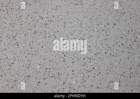 Texture of a grey quartz stone countertop close-up Stock Photo - Alamy