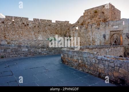 Sunrise view of the Saint Athanasios gate of Rhodes in Greece Stock ...
