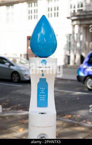 A water server is seen in central London Stock Photo - Alamy