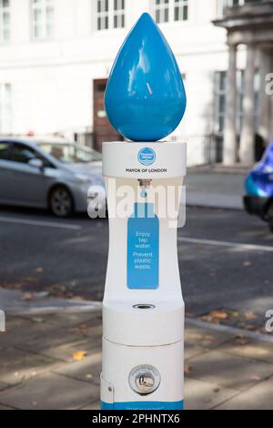 A water server is seen in central London Stock Photo - Alamy