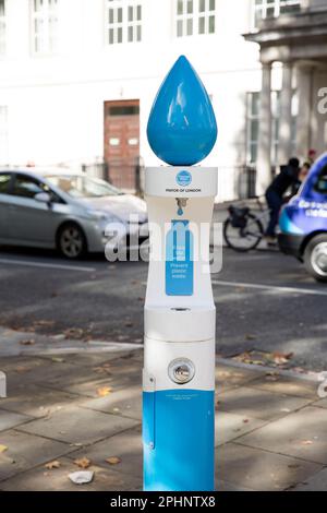 A water server is seen in central London Stock Photo - Alamy