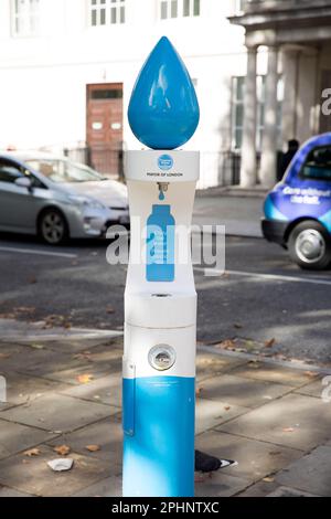 A water server is seen in central London Stock Photo - Alamy