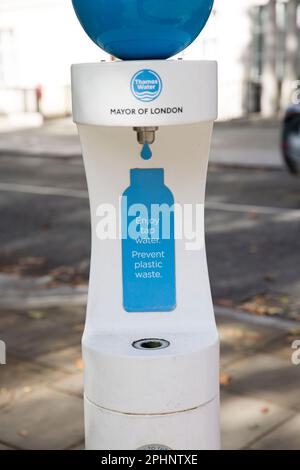 A water server is seen in central London Stock Photo - Alamy
