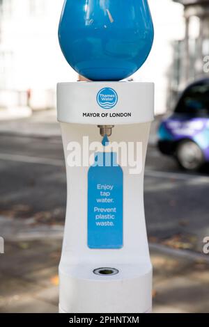A water server is seen in central London Stock Photo - Alamy