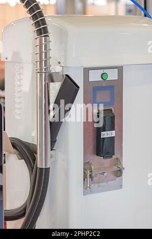 Coin operated vacuum at car wash Stock Photo - Alamy