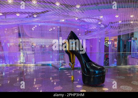 Beautiful interior view of Cosmopolitan. Giant black high heel shoe as ...